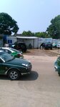 D. O Multiservices (Brazzaville, Commune de Ouenzé, Rue Lenine), otopark alanı  Brazzaville'den