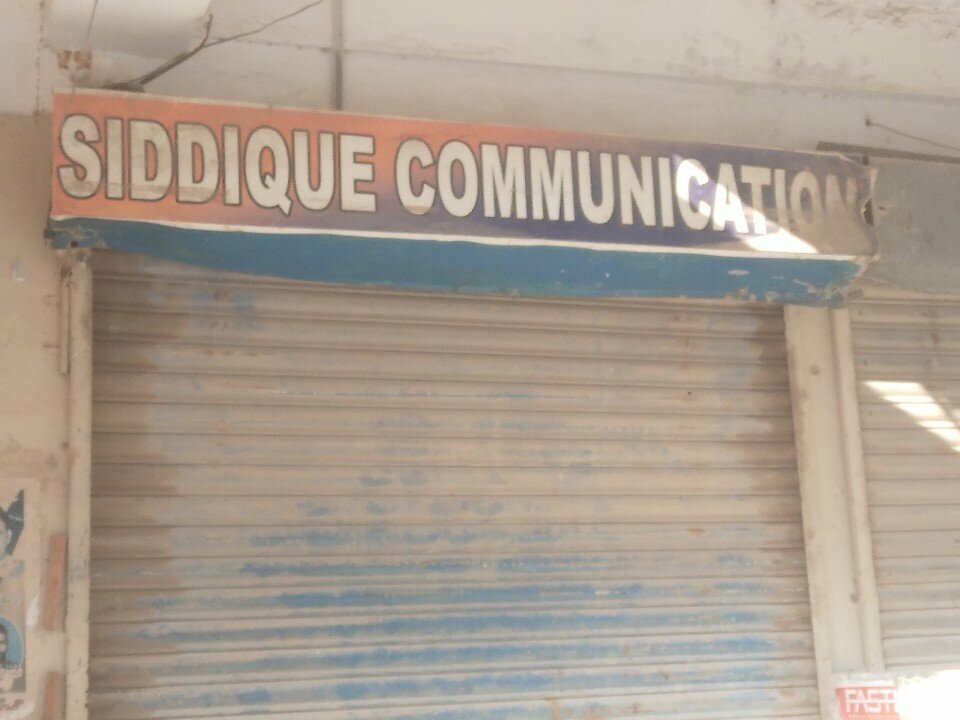 Cep telefonu aksesuarları Siddiqui communication, Karaçi, foto