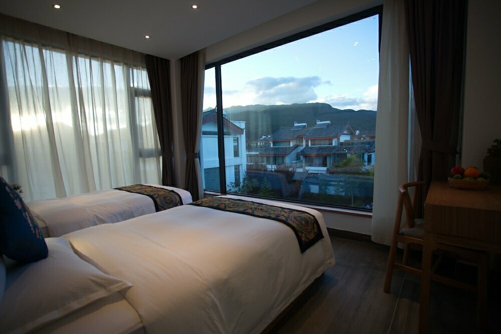 Otel Lijiang Stay Long Guest House, Lijiang, foto