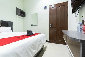 RedDoorz near Medan Amplas (South Sumatra, Ogan Komering Ilir Regency, Lempuing Jaya, Suka Maju), otel  Medan'dan