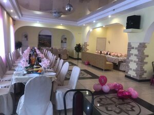 Kafe Наш двор, Şçuçye, foto