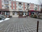 O'zinshe (Abaya Avenue No:134), giyim mağazası  Taraz'dan
