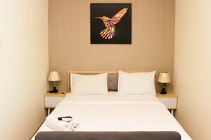 Cozy And Warm Studio At Grand Kamala Lagoon Apartment (LRT Jabodetabek, Bekasi Barat), otel  Bekasi'den