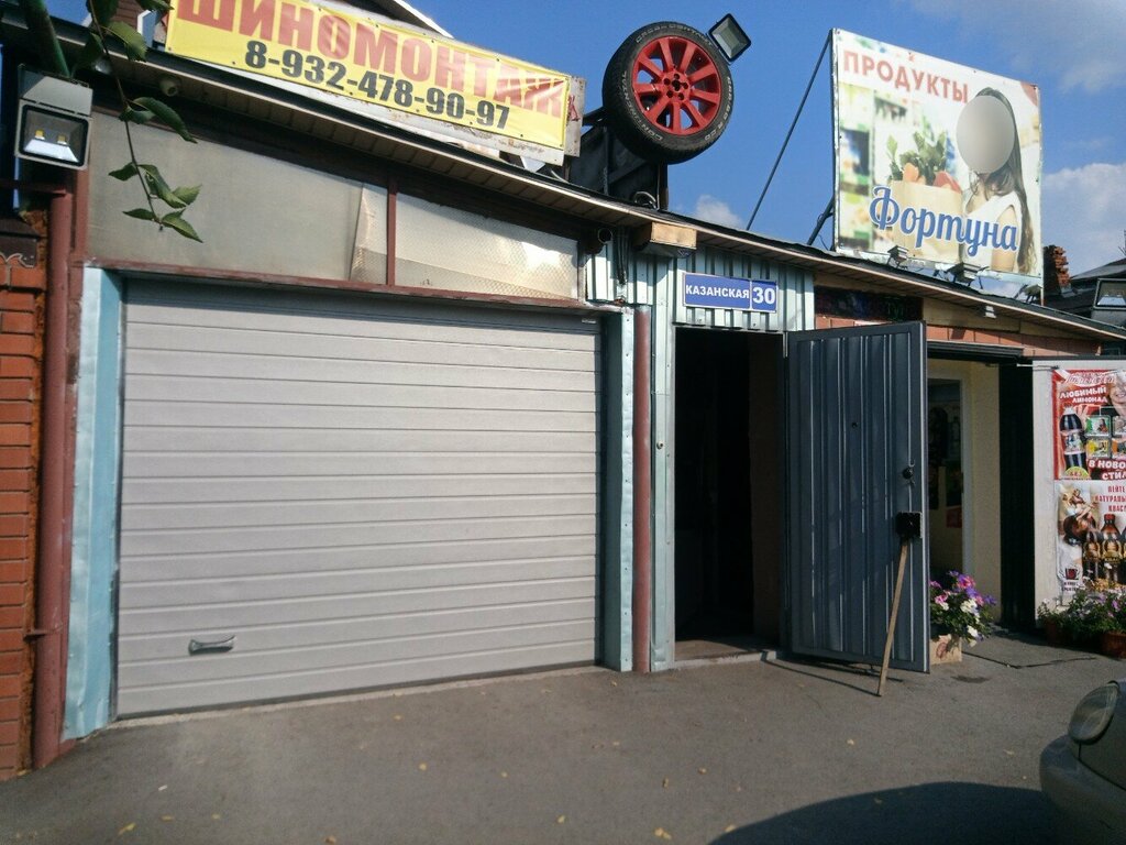 Oto lastik tamiri Shinomontazh na gore, Tiumen, foto