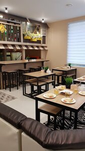 Визит центр (Torgovaya ulitsa No:15А, selo Krabozavodskoye), kafe  Sahalin Bölgesi'nden