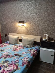 Уют (ulitsa Lenina No:25А, posyolok gorodskogo tipa Magdagachi), otel  Amursk Bölgesi'nden