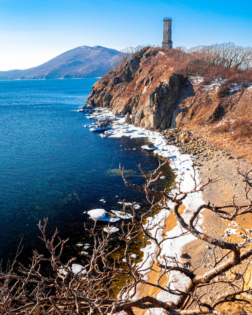 Turistik yerler Маяк бухты Абрек, Primoriye, foto