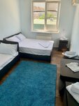 Gostevoj Dom U Morya (ulitsa Tolbukhina No:10), otel  Gelencik'ten