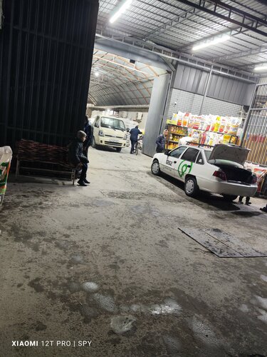 Market Quva Un Center, Küve (Kuva), foto