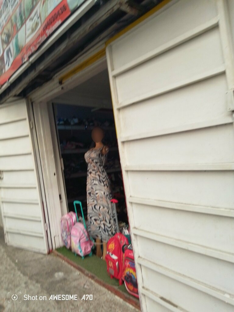 Giyim mağazası Boutique de roupa, Loanda, foto