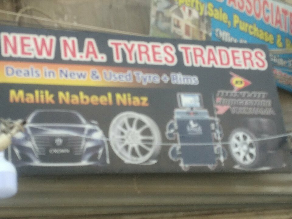Jant ve lastikçiler New Na tyres traders, Karaçi, foto
