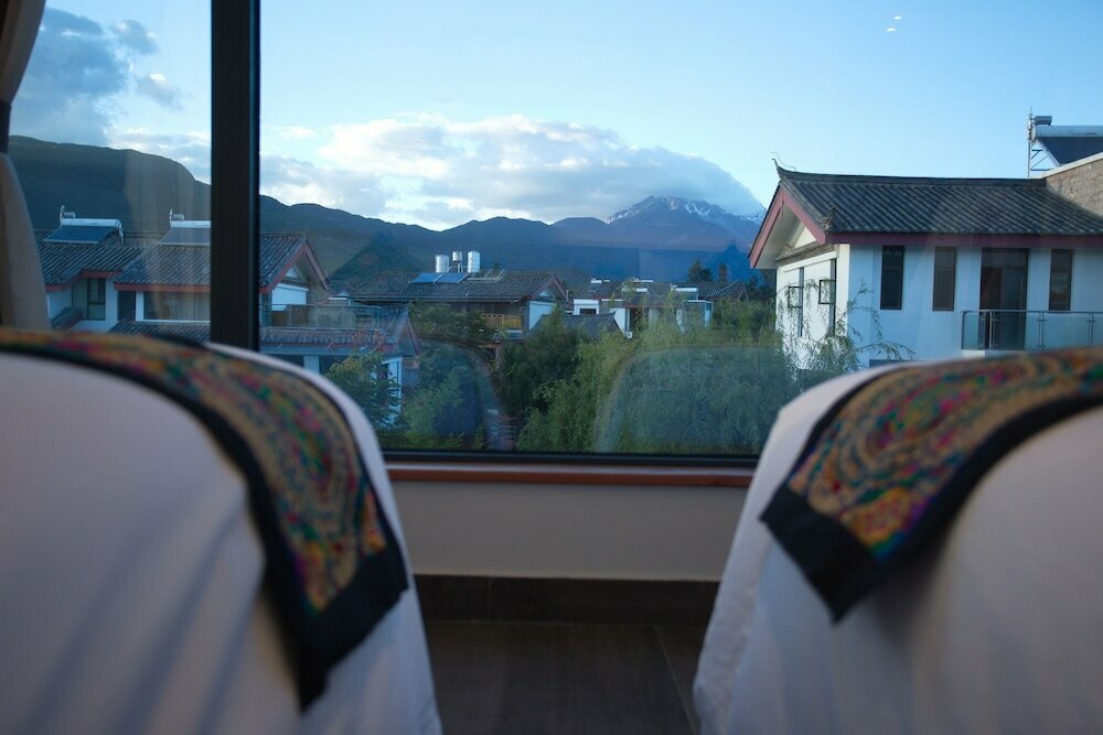Otel Lijiang Stay Long Guest House, Lijiang, foto