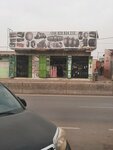 Comércio geral (Luanda, Avenida Dom Moisés Alves de Pinho), jant ve lastikçiler  Loanda'dan
