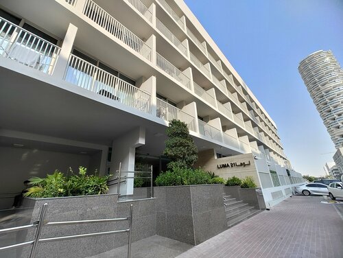 Adlandırılmış bina Luma 21, Dubai, foto