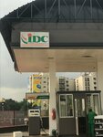 Station Idc sococe deux plateaux (Abidjan, Cocody, Quartier de la Deux Plateaux 1-ae), benzin istasyonu  Abican'dan