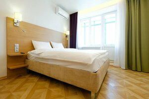 Апартаменты Петровские на Советской 90 (Soviet Street No:90), otel  Tomsk'tan