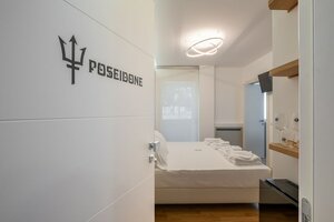 Helios Guesthouse (Sardinia, Cagliari, Viale Poetto, 108), otel  Cagliari'den