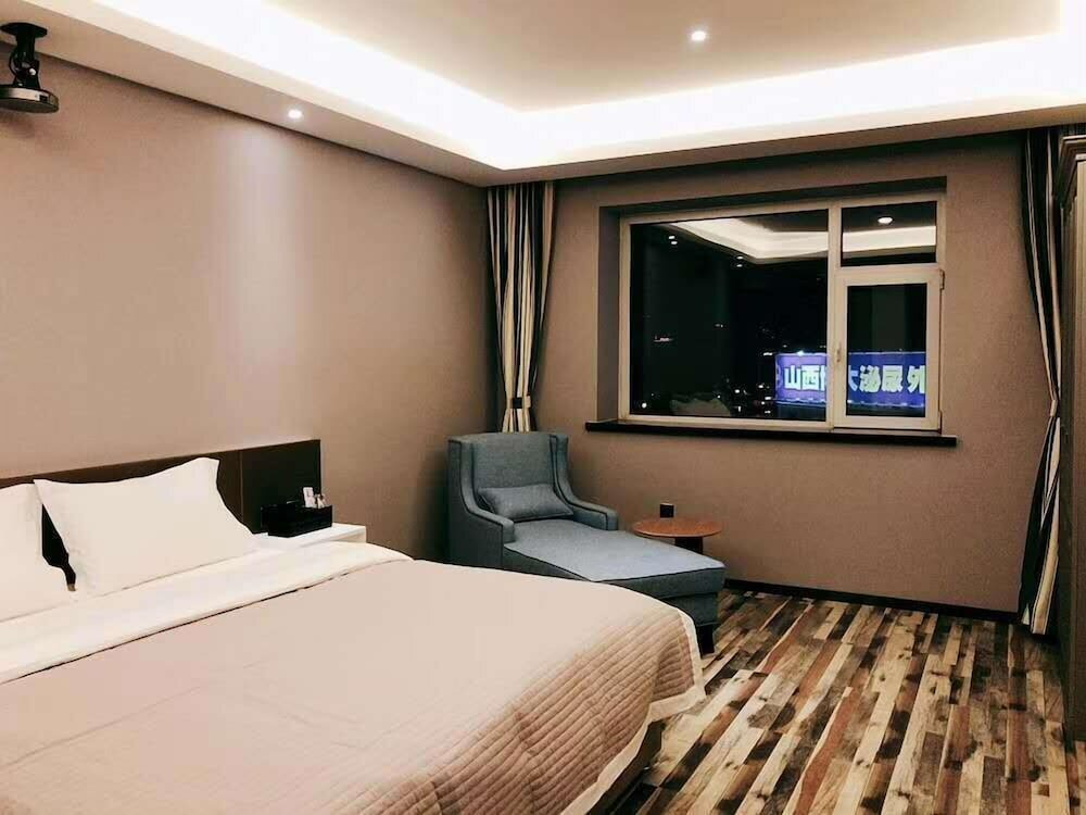 Otel Taiyuan Strawberry Apartment Xuefu Br, Taiyuan, foto