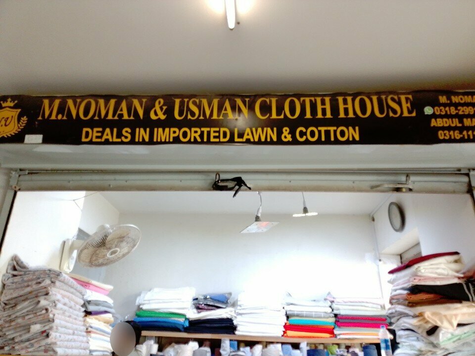 Dış giyim mağazası M. noman cloth house, Karaçi, foto