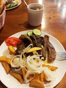У Харитона (Omskaya ulitsa No:1А/4, selo Troitskoye), kafe  Omskaya oblastından