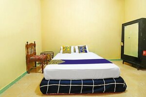 Spot On 91222 Kanjeng Mami Homestay Syaria (Jambi, Jambi City, Jambi), otel  Jambi'den