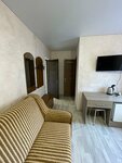 Gostevoi dom Na Sadovoi 21 (Садовая улица No:21, посёлок городского типа Новофёдоровка), otel  Kırım Cumhuriyeti'nden