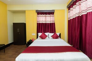 Oyo Flagship 10491 Pumpkin Rooms Rynjah (State of Meghalaya, City of Shillong), otel  Shillong'dan