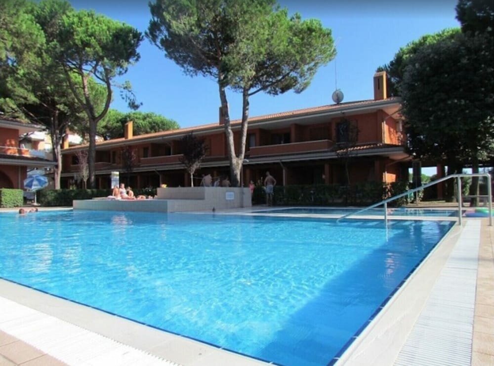 Kısa süreli konaklama New Condo Bibione Centre - Airco - Private Parking - Beach Place Included, Dünya, foto