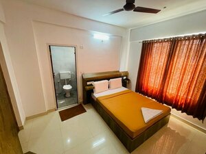 B Six Hotel And Lodge (State of Karnataka, Bengaluru, Green line, Krishna Rajendra Market metro station), otel  Bangalor'dan