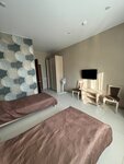 Санрайс (Shkolnaya ulitsa No:1А, selo Andreyevka), otel  Primoriye'den