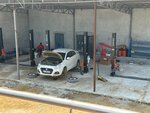 Moobi (Abidjan, Cocody, Quartier de la Djorobité I), oto kaporta  Abican'dan