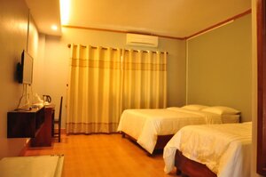 Pilgrim's Kitchen & Inn (Savannakhet Province, Kaysone Phomvihane District, Town of Savannakhet), otel  Savannakhet'ten