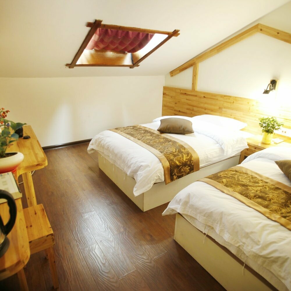 Otel Wulingyuan Tu Youth Hostel, Hunan, foto