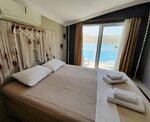 Bozburun'da Plaja Yakın Deniz Manzaralı Sıcak Daire (Muğla, Yatağan, Cumhuriyet Cad., 35), kısa süreli konaklama  Menteşe'den