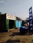 H. M (Brazzaville, Avenue des Trois Martyrs), jant ve lastikçiler  Brazzaville'den