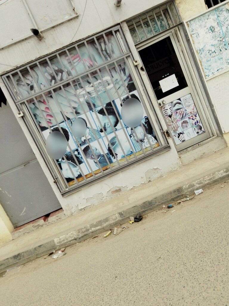 Berberler Barbearia, Loanda, foto