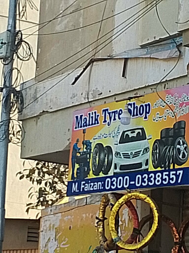 Jant ve lastikçiler Malik, Karaçi, foto