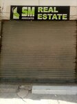 SM real estate (No:675, Jamshed Quarters, Shikarpur Colony), emlak ofisi  Karaçi'den