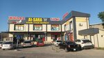 Kaspi Postomat (Bostan Álimbetov kóshesi No:43, Qatynkópir móltekaýdany), parsel otomatı  Çimkent'ten (Şımkent'ten)
