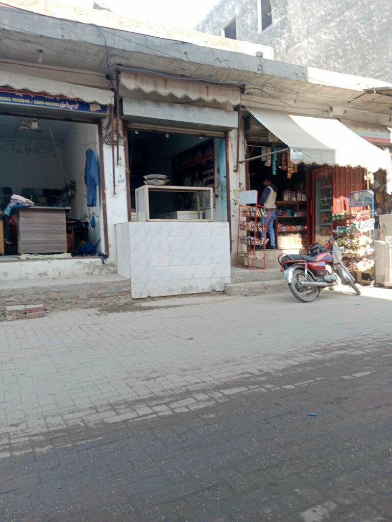 Bebek besleme merkezleri Bhully Shah Milk Shop, Lahor, foto