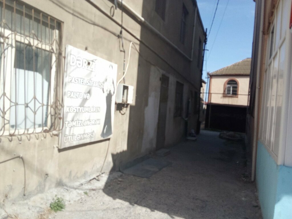 Kıyafet tamiri Dərzi, Bakü, foto