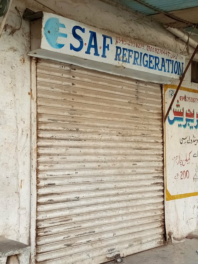 Elektrikli cihazların tamiri S. A. F refrigerator, Karaçi, foto