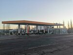Rompetrol (R13), benzin istasyonu  Beltsi'den