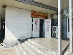 Салиха (Tyumenbay Baizakov Avenue No:40), giyim mağazası  Celalabat'tan
