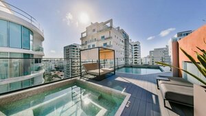 Breakfast Included Fully Serviced Apartment at Regatta Living II - 502 (Santo Domingo), otel  Santo Domingo'dan
