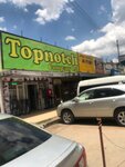 Topnotch Co (Chiparamba Road No:51), giyim mağazası  Lusaka'dan