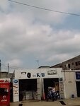 K. B (Brazzaville, Commune de Moungali, Rue Moundzombo), oto lastik tamiri  Brazzaville'den