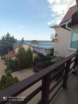 Гостевой дом Атея (Приморская улица No:1А, село Береговое), otel  Kırım Cumhuriyeti'nden