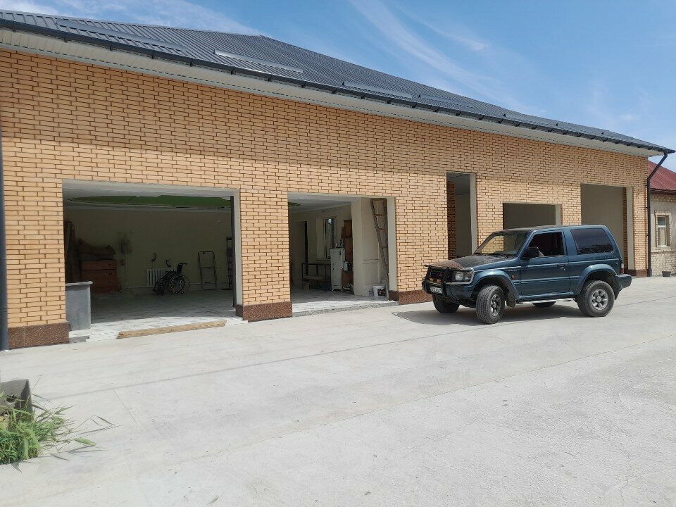 Otopark ve tamirhaneler Specialized Public Service Center for Drivers, Kızılorda, foto