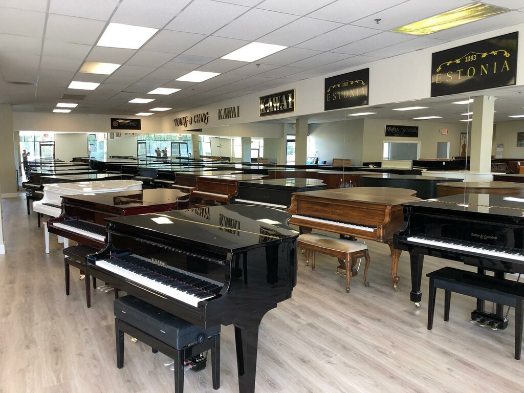 Müzik enstrumanların tamiri Kim's Piano, Tustin, foto